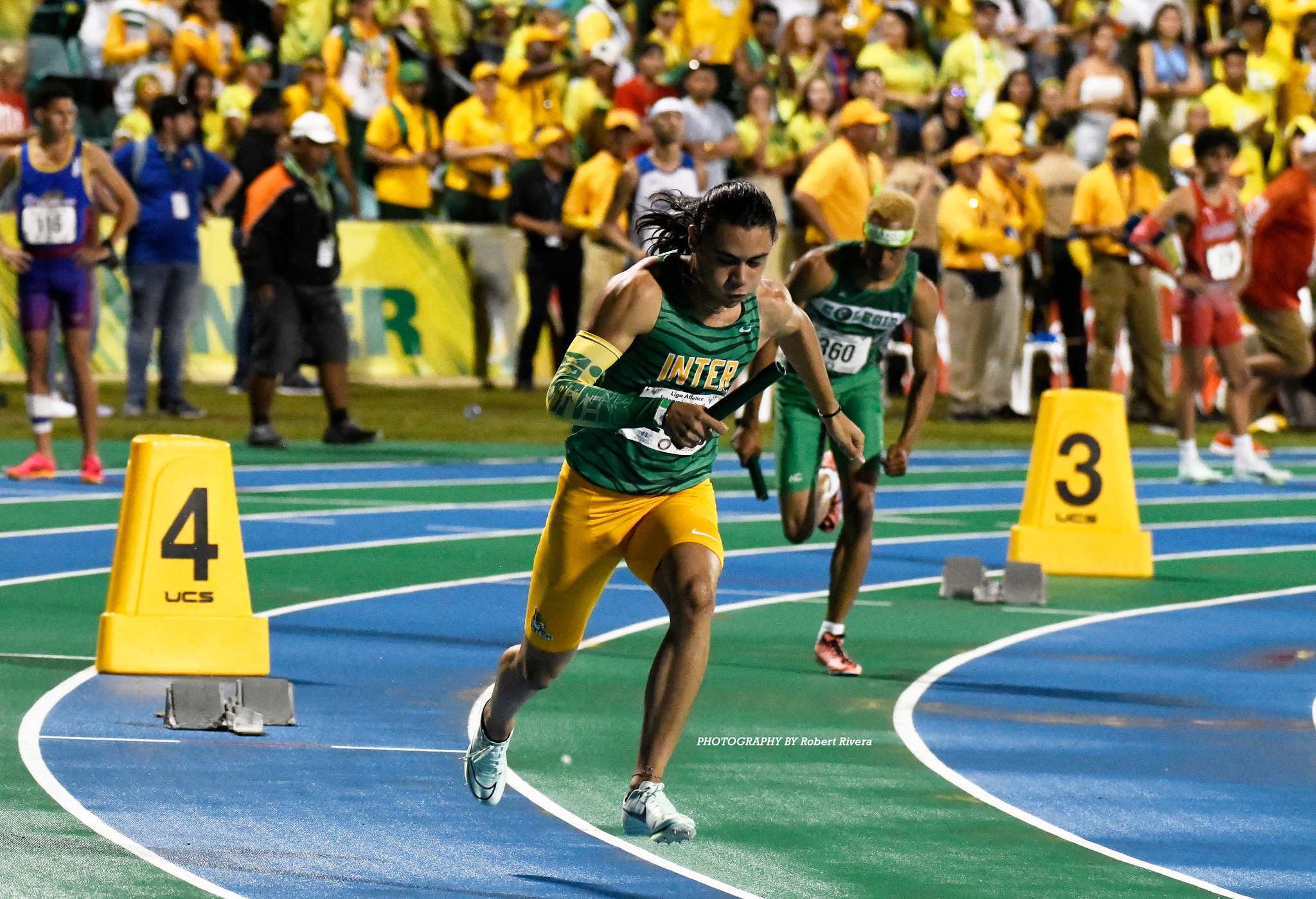 La fabulosa prueba del relevo 4×400 de las Justas de la LAI en el lente ...